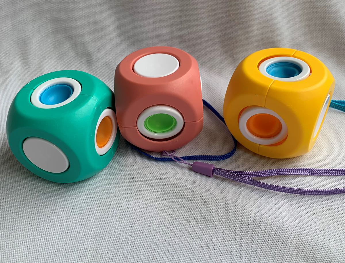 Fidget Spinning Cube with Pop Dimples – Katie Papaya